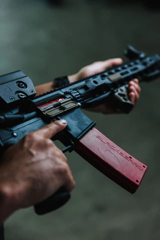 Blackbeard: the auto-resetting trigger system for AR-15 with laser